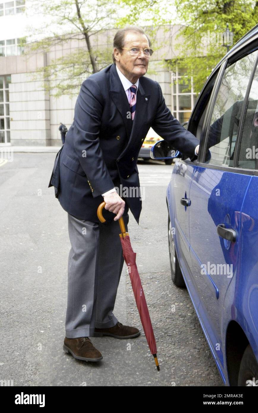 "James Bond" stars Sir Rodger Moore, Sir Christopher Lee and Richard ...