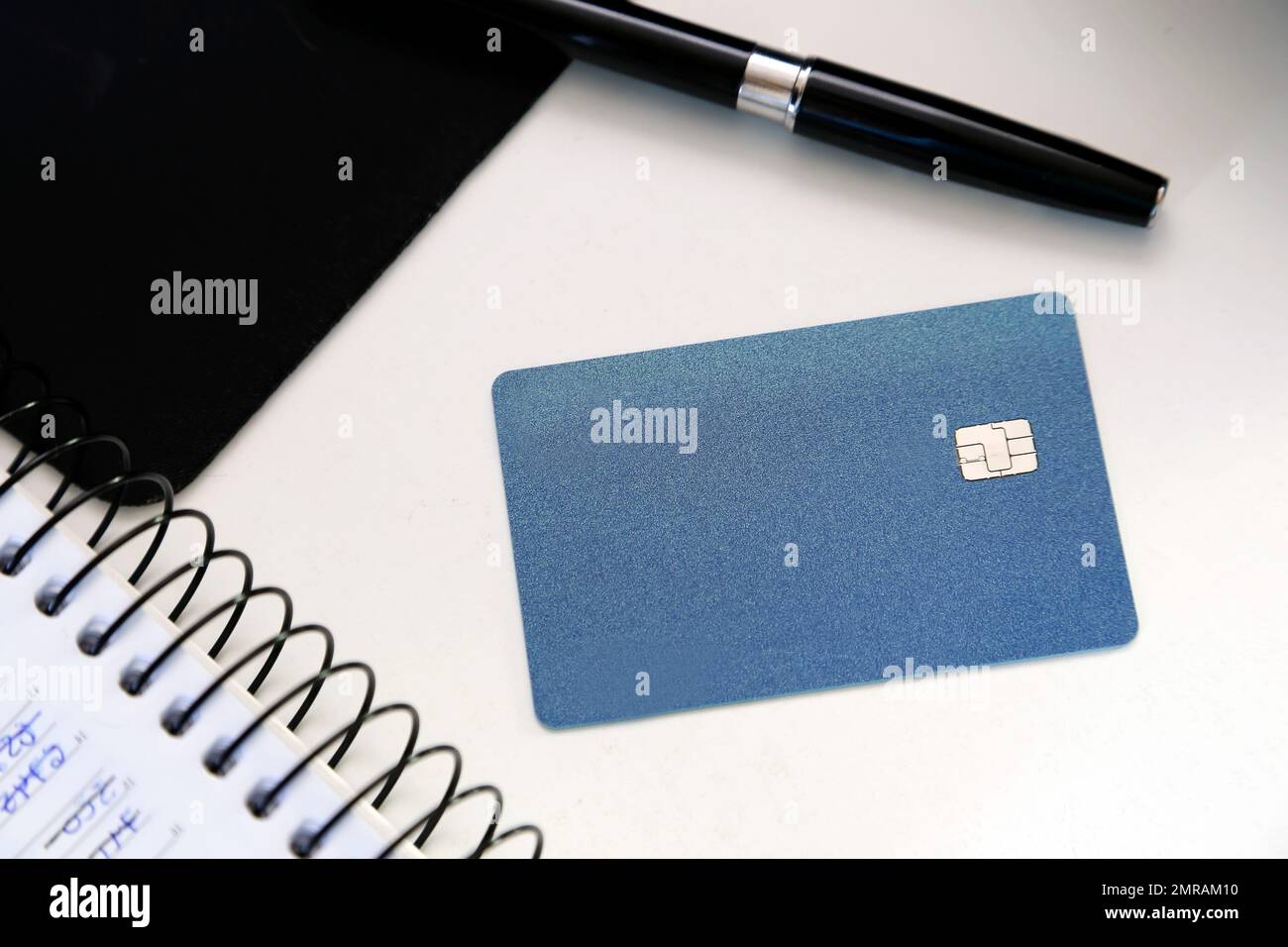 blue credit or debit contactless card with contact less sign at the ...