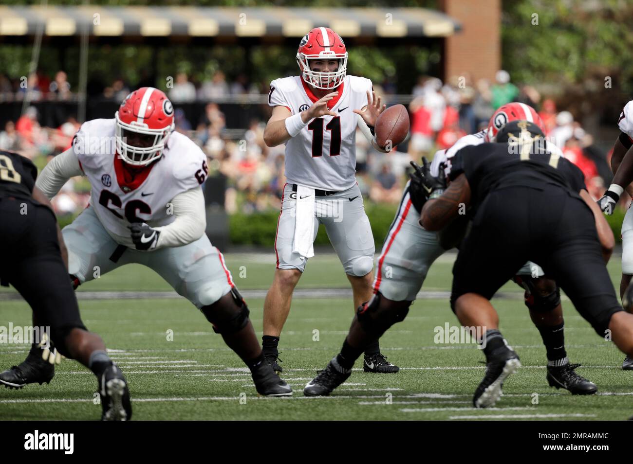 Georgia quarterback Jake Fromm (11) takes a snap against Vanderbilt in ...