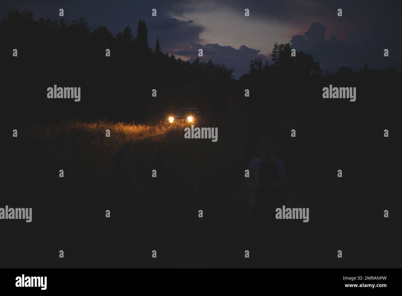 Headlights night woman hi-res stock photography and images - Alamy