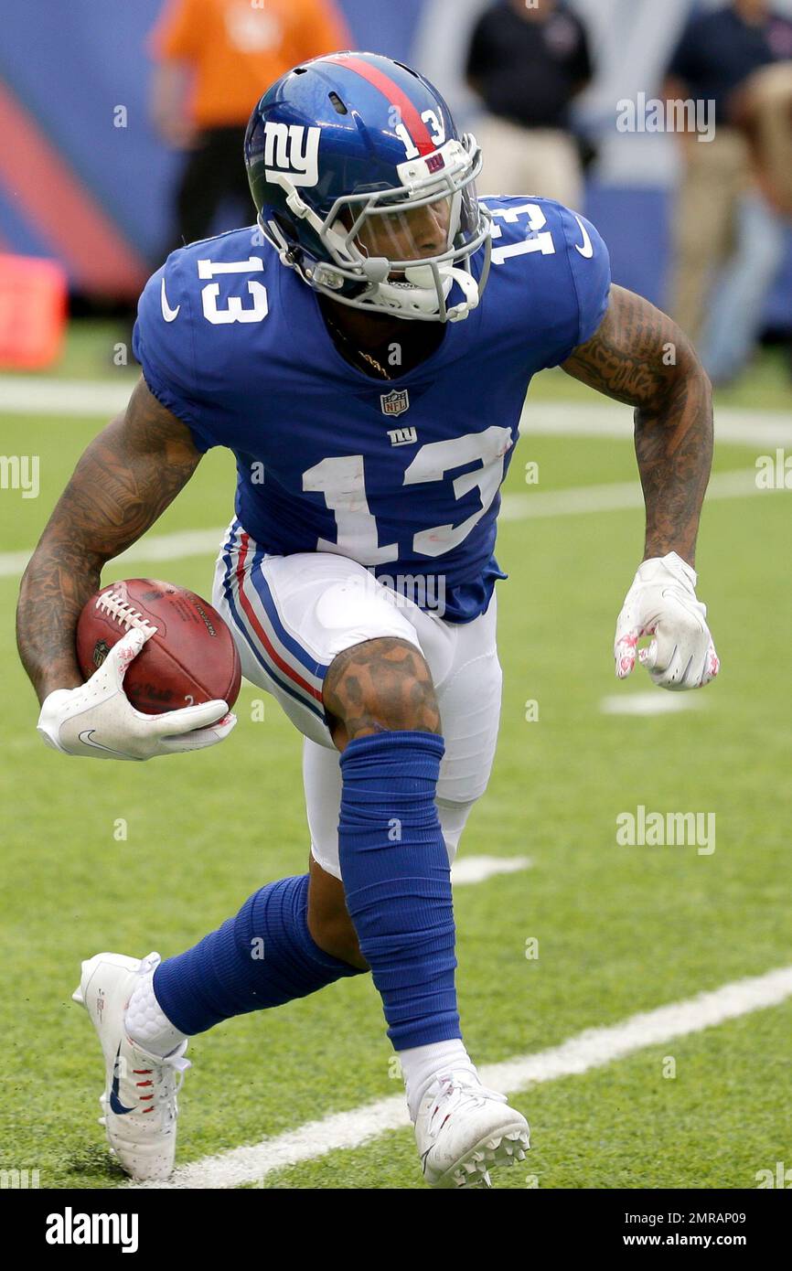 New York Giants' Odell Beckham returns a punt to the Los Angeles ...