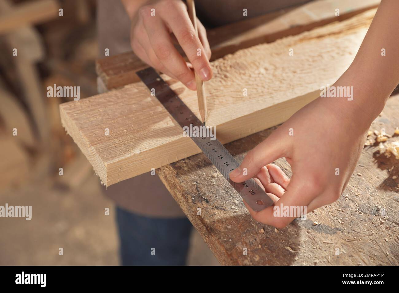 Closeup construction worker measuring board hi-res stock photography ...