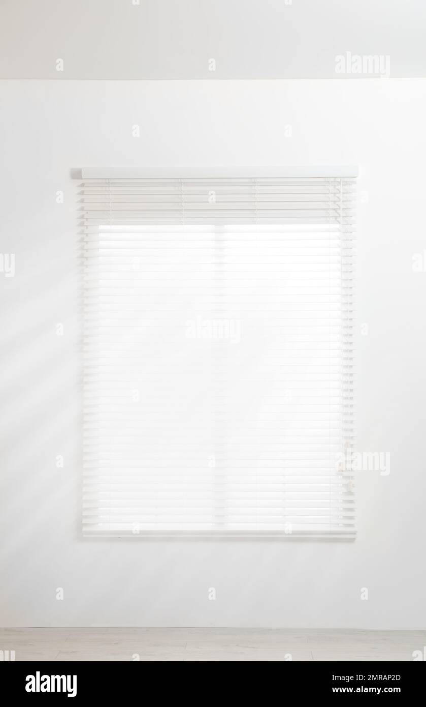 Modern window with open blinds in room Stock Photo - Alamy
