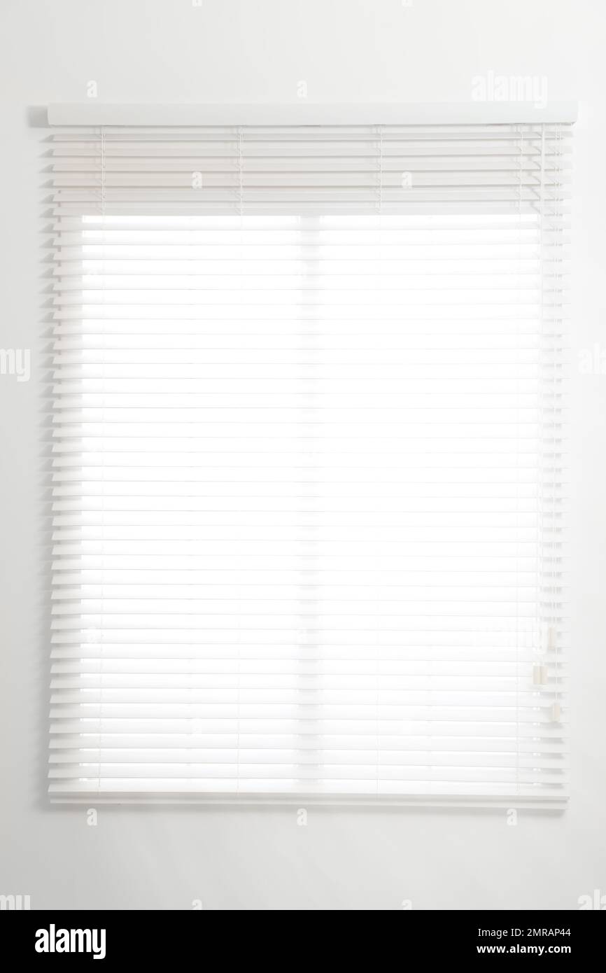 Modern window with open blinds in room Stock Photo - Alamy