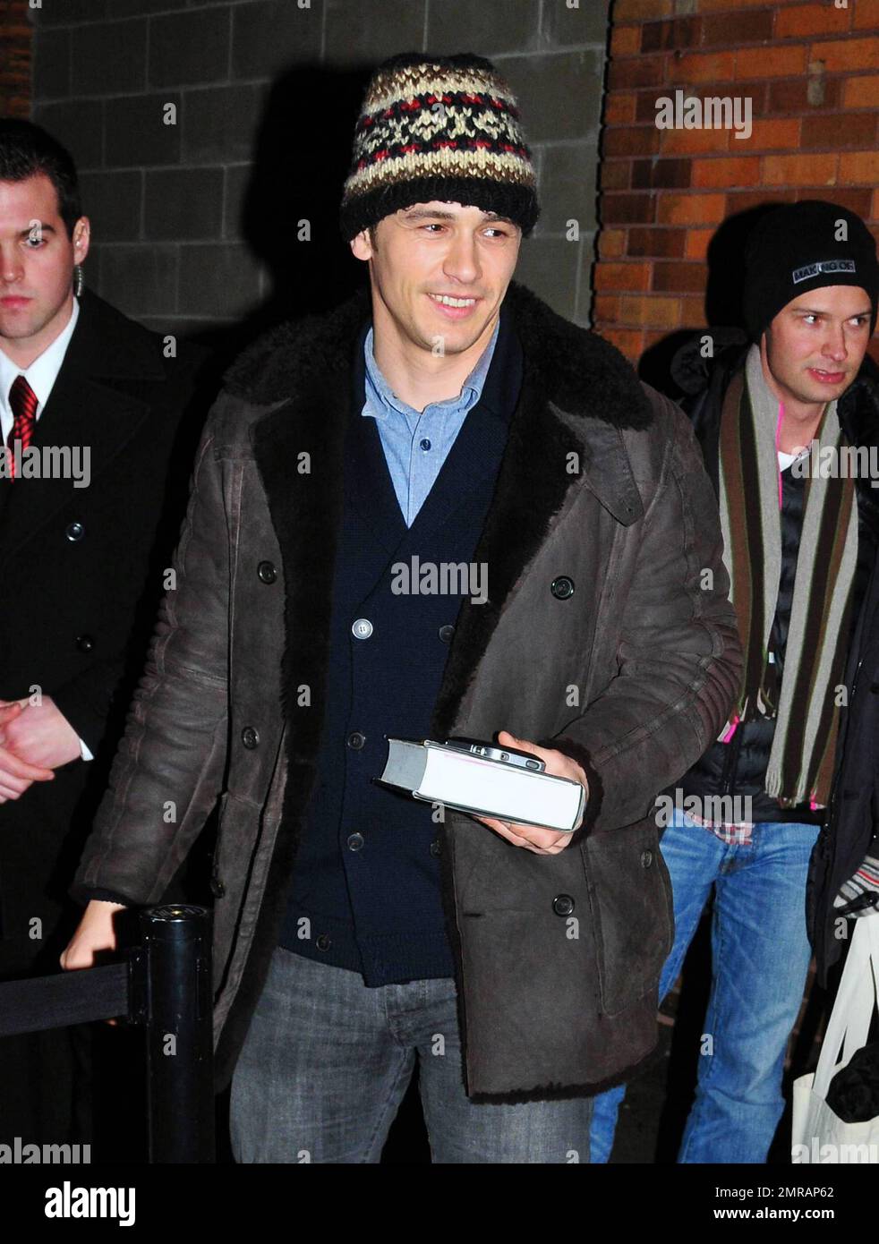 James Franco signs autographs outside the "John Stewart Show" studios ...