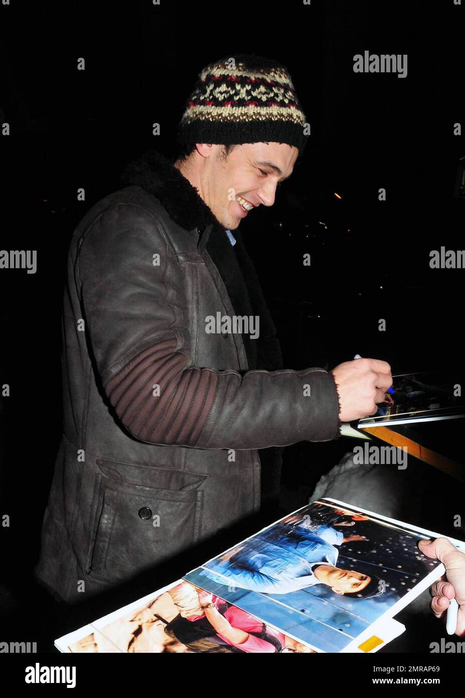 James Franco signs autographs outside the "John Stewart Show" studios ...