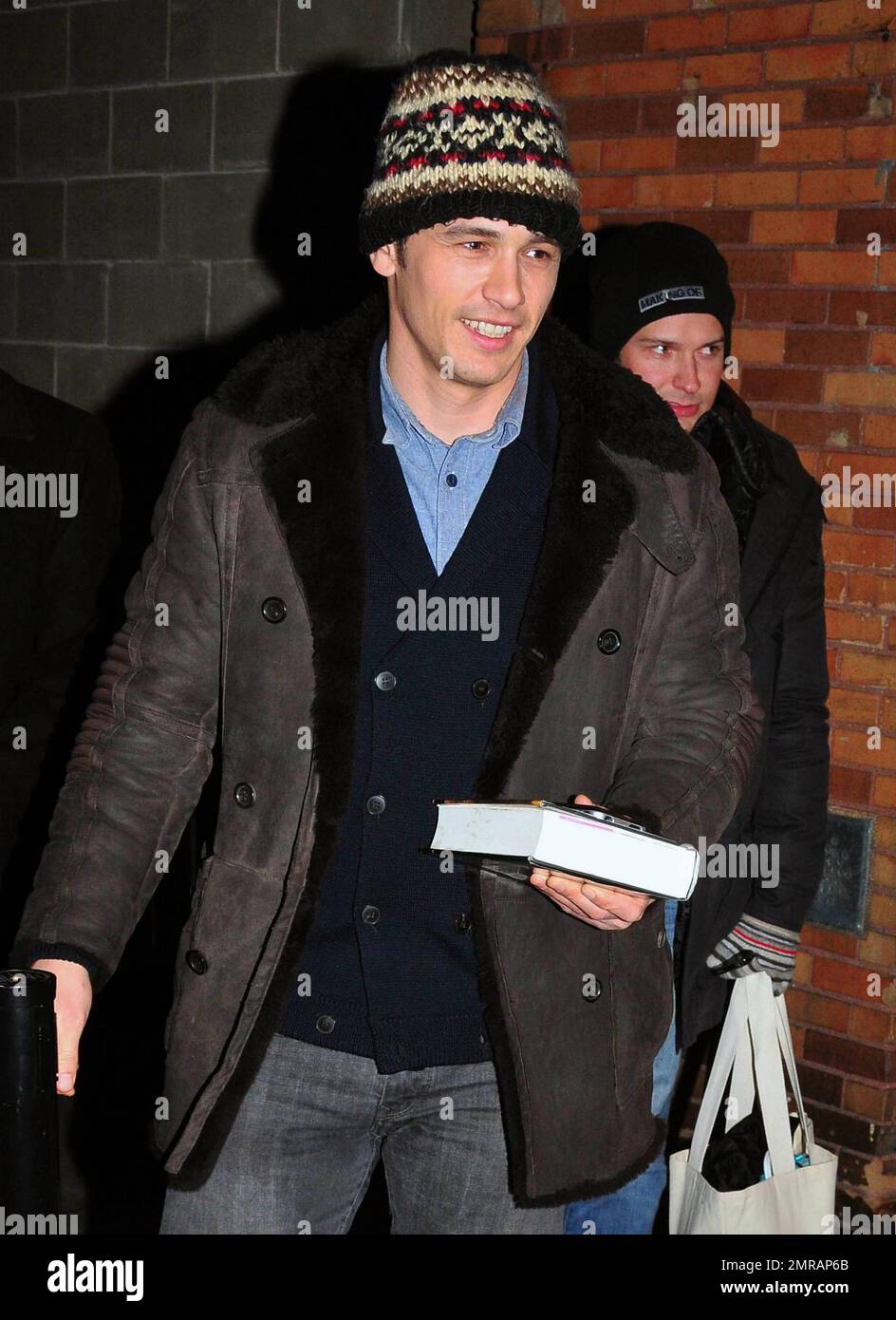 James Franco signs autographs outside the "John Stewart Show" studios ...