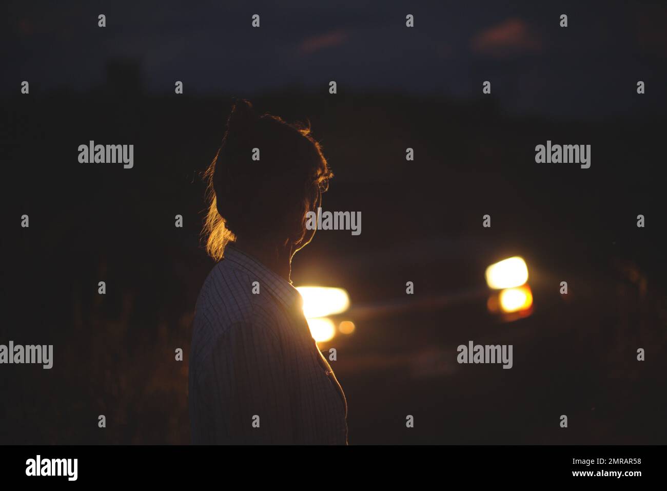 Headlights night woman hi-res stock photography and images - Alamy