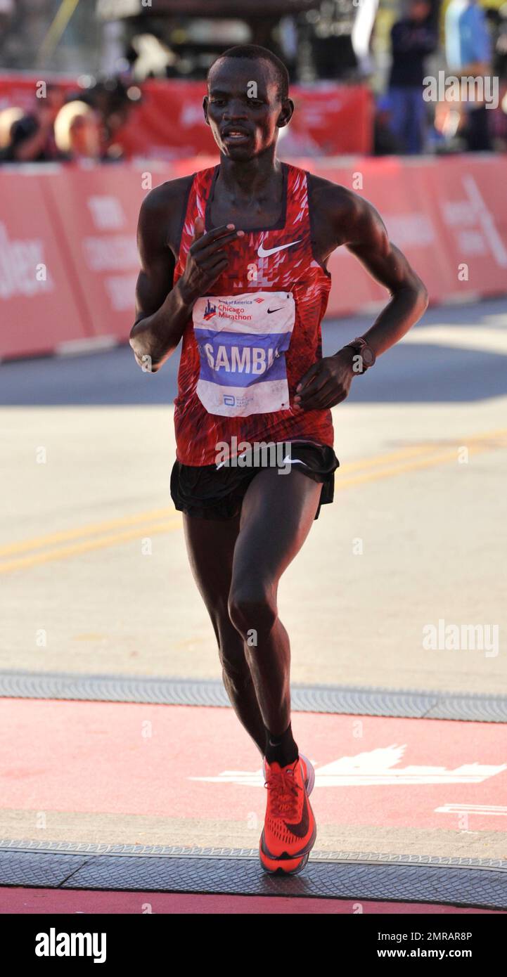 Stephen Sambu, of Kenya, finishes in fifth place during the Bank of ...