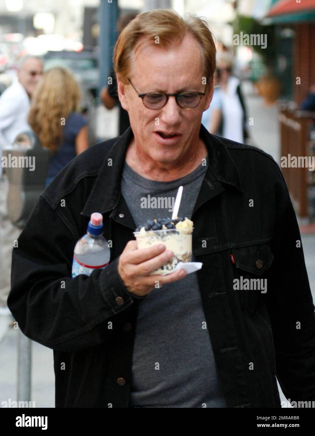 "Shark" star actor James Woods enjoys an ice cream while out and about ...