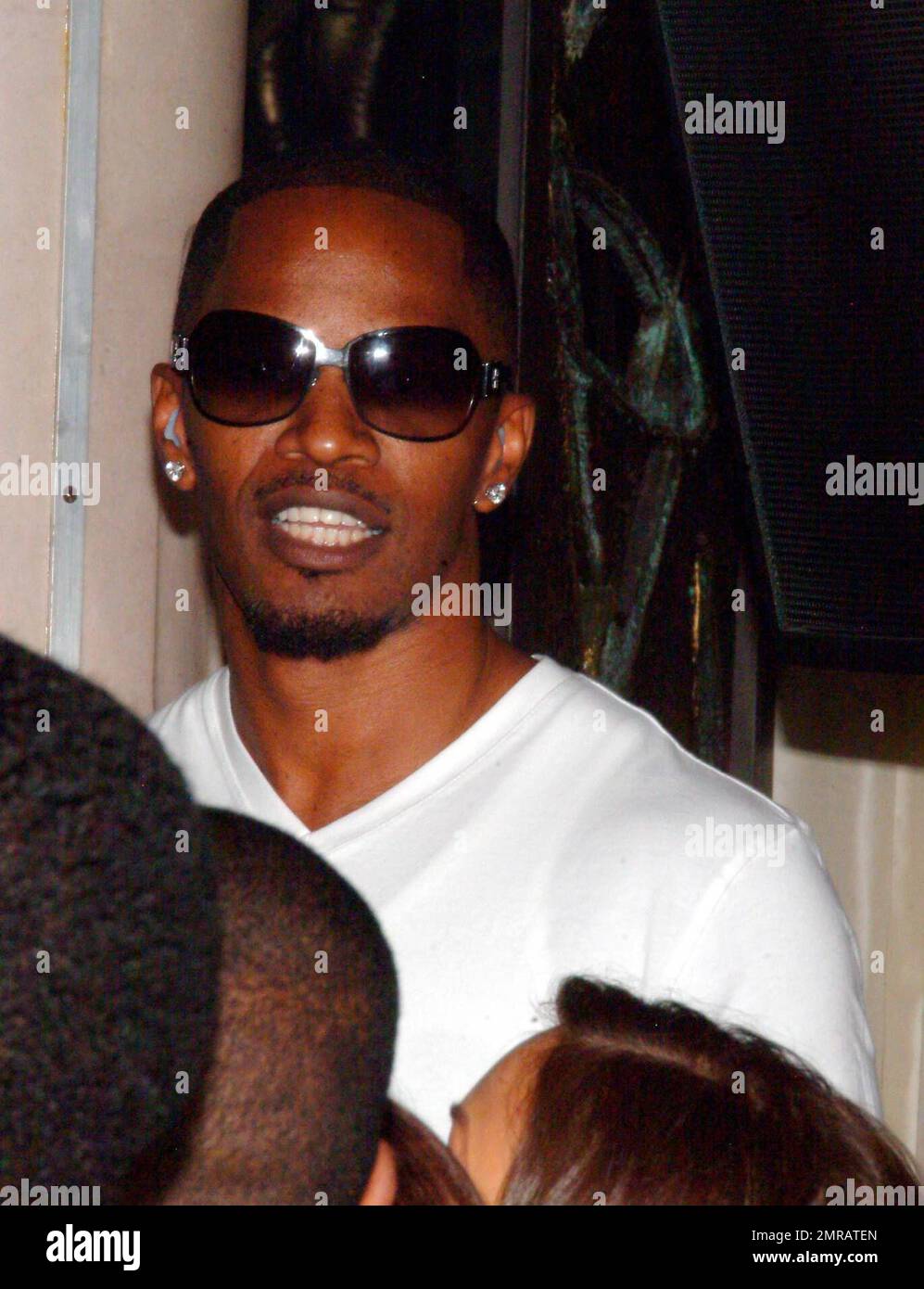Exclusive!! Jamie Foxx celebrates the New Year with champagne and ...