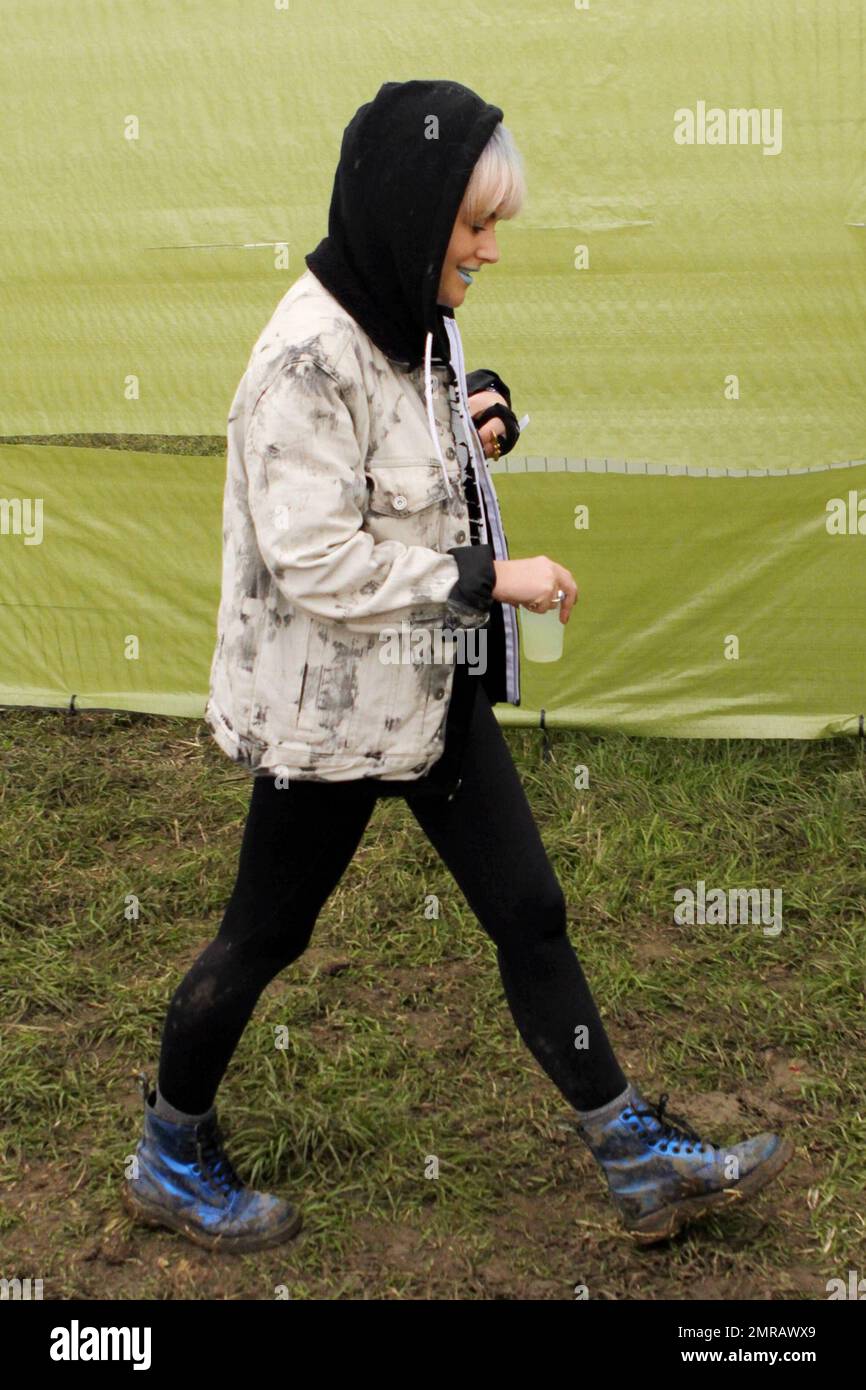 Jamie Winstone wears blue lipstick that matches her muddy Doc Marten ...