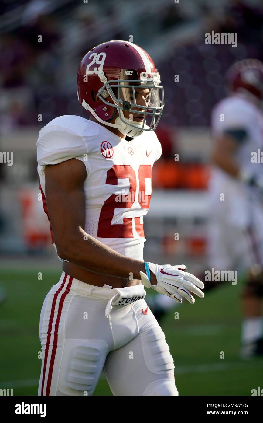 Alabama's Minkah Fitzpatrick warms up before an NCAA college football ...