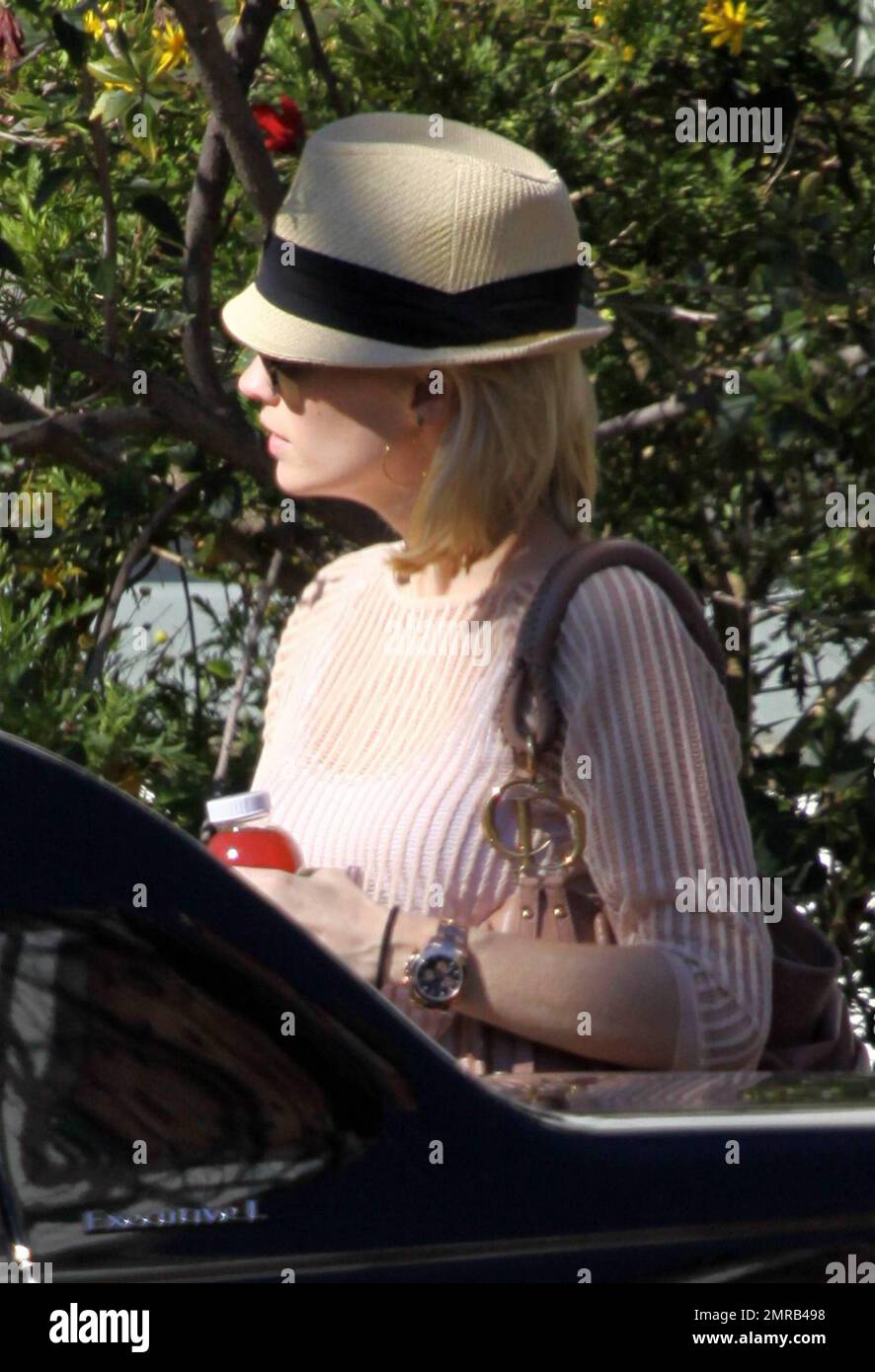 "Mad Men" actress January Jones dons a cool fedora and shades as she is ...