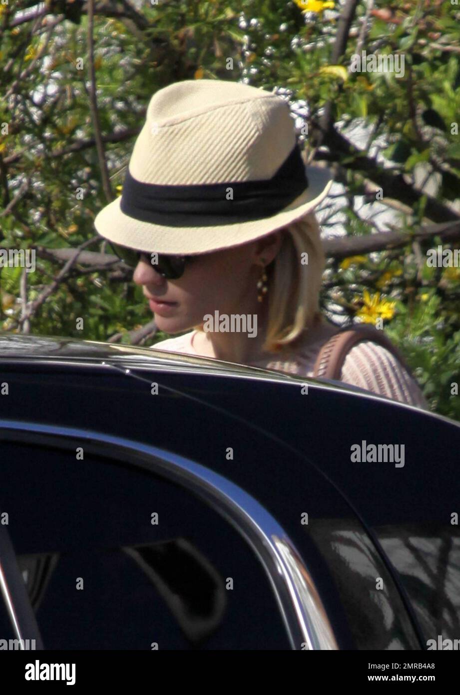 "Mad Men" actress January Jones dons a cool fedora and shades as she is ...