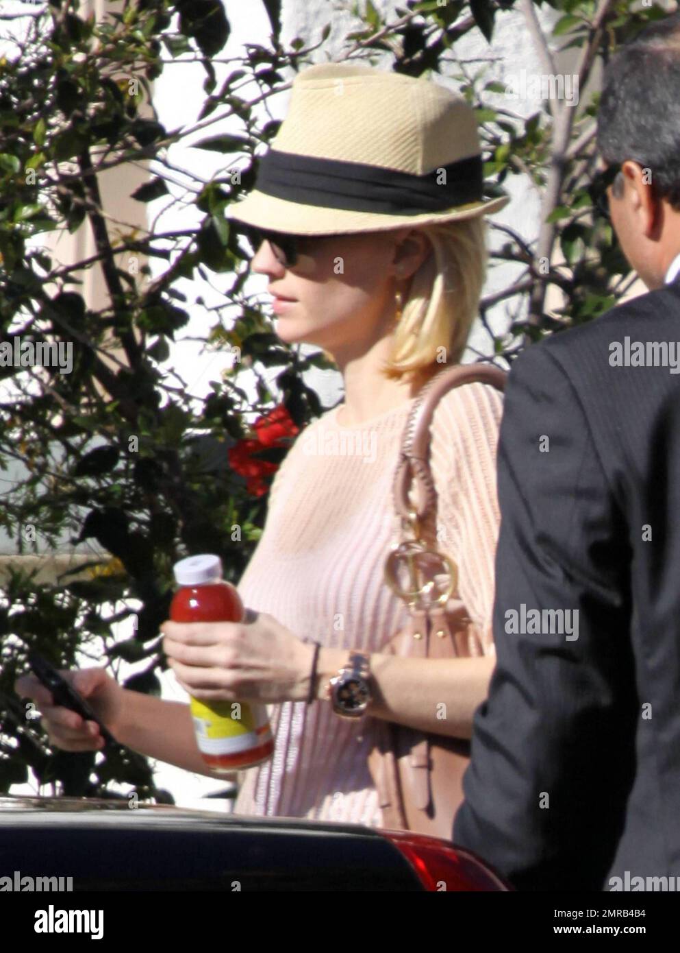 "Mad Men" actress January Jones dons a cool fedora and shades as she is ...