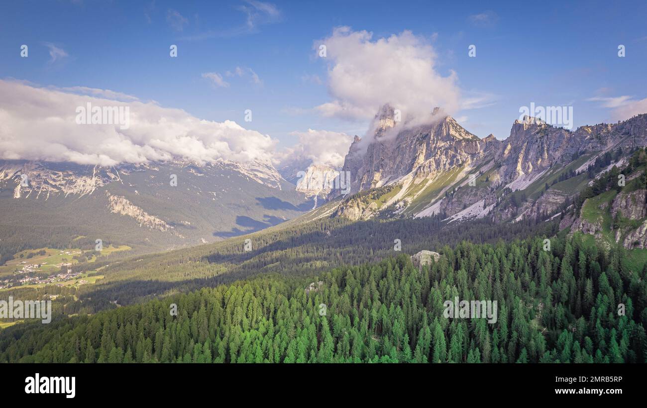 The winter Dolomites mountain view at sunrise, shiny sun and clear sky ...