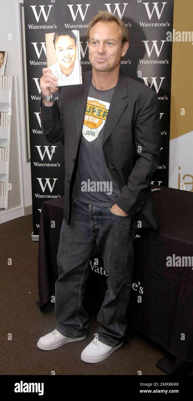Pop singer and former "Neighbours" star Jason Donovan signs copies of ...