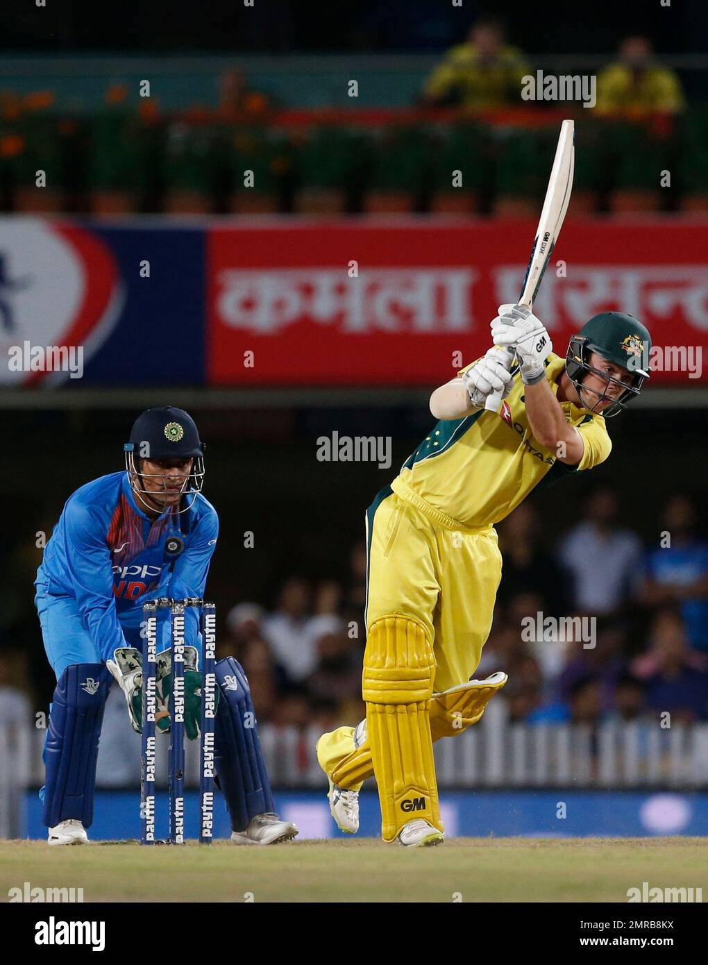 Australian cricket player Moises Henriques plays a shot during their ...