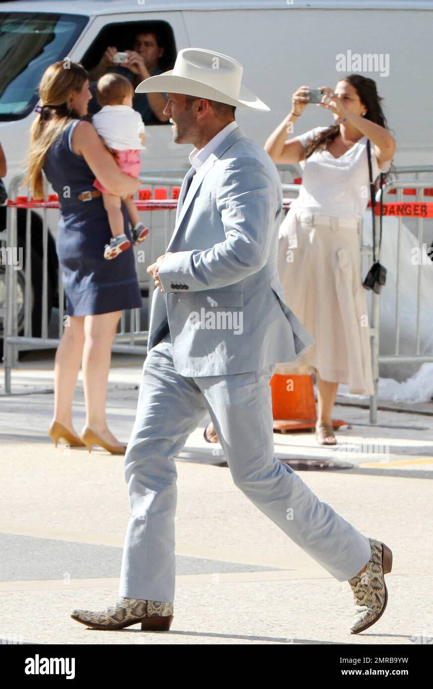 Jason Statham wears country western wear, complete with cowboy hat and ...