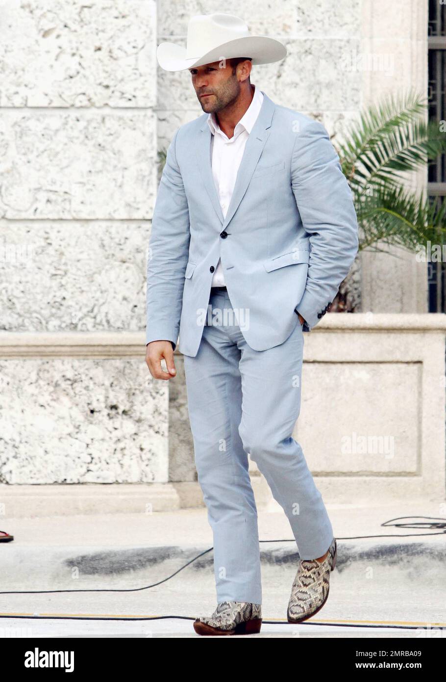 Jason Statham wears country western wear, complete with cowboy hat and ...