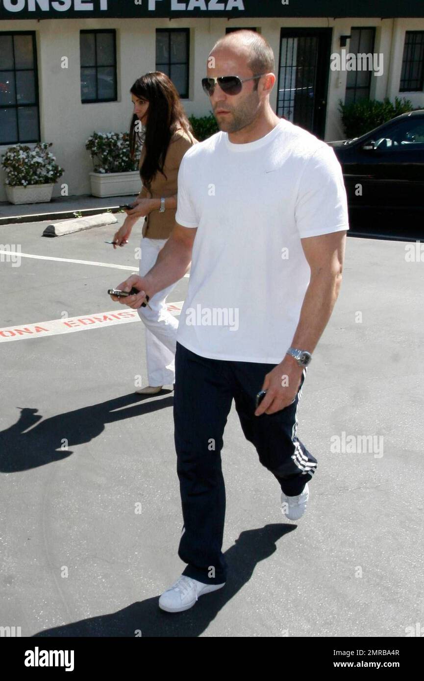In a rush to get away from two photographers, Jason Statham leaves ...