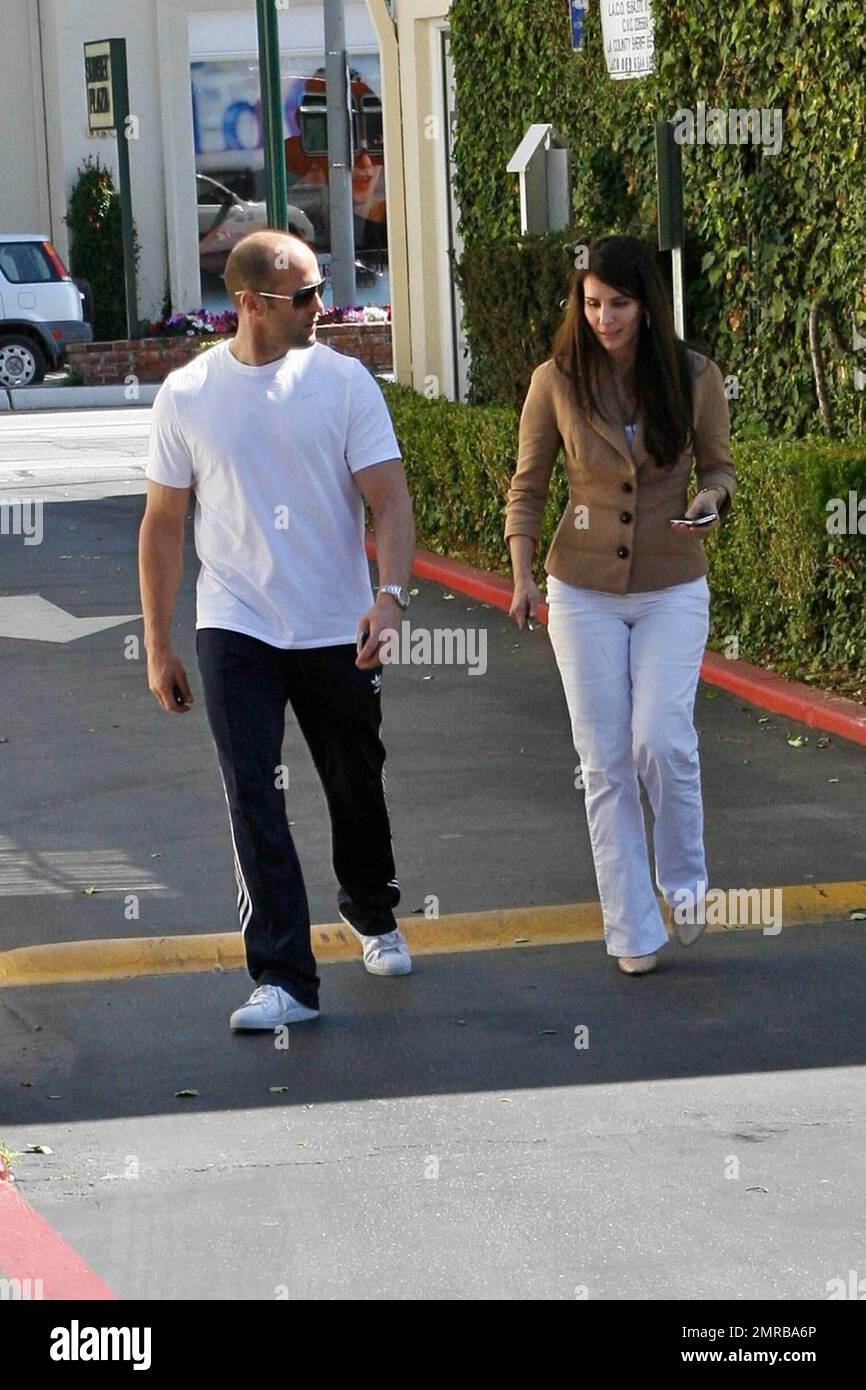 In a rush to get away from two photographers, Jason Statham leaves ...