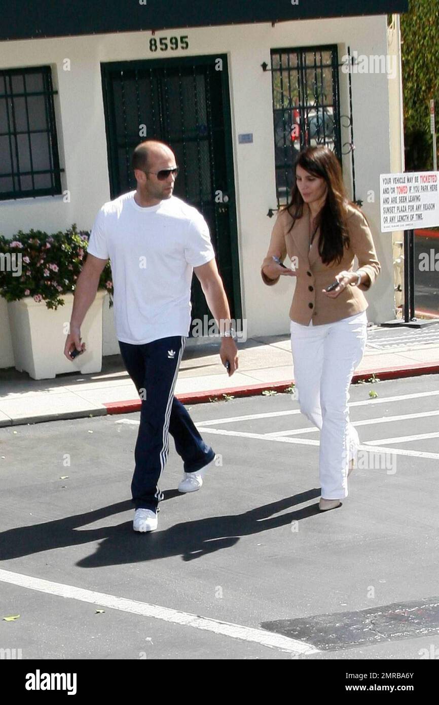 In a rush to get away from two photographers, Jason Statham leaves ...