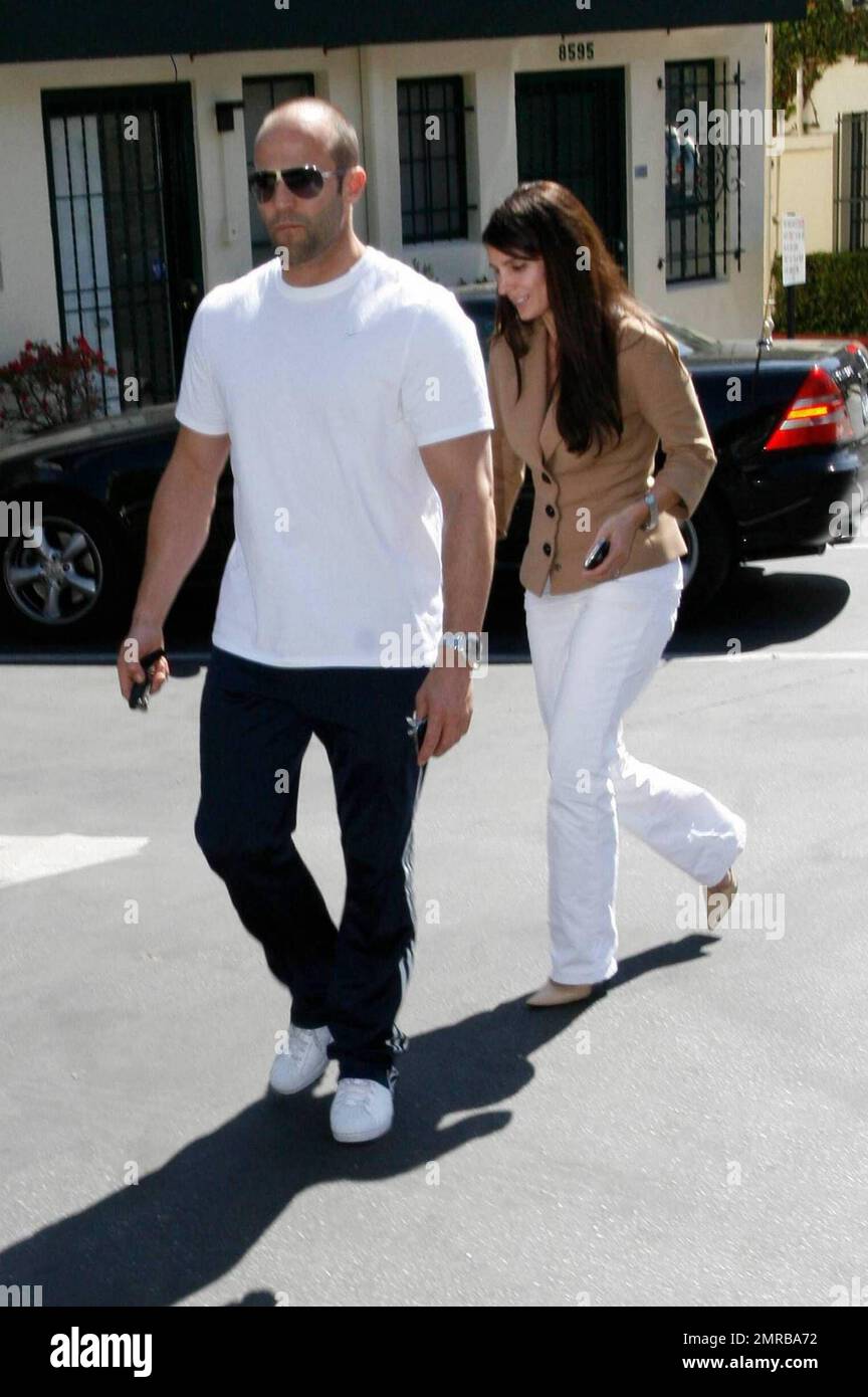 In a rush to get away from two photographers, Jason Statham leaves ...