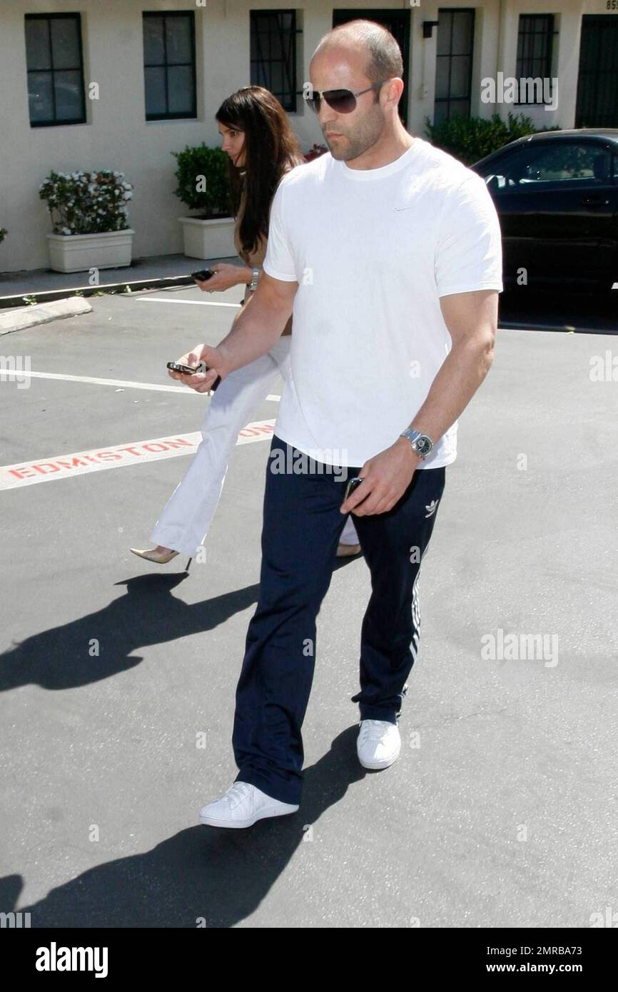 In a rush to get away from two photographers, Jason Statham leaves ...