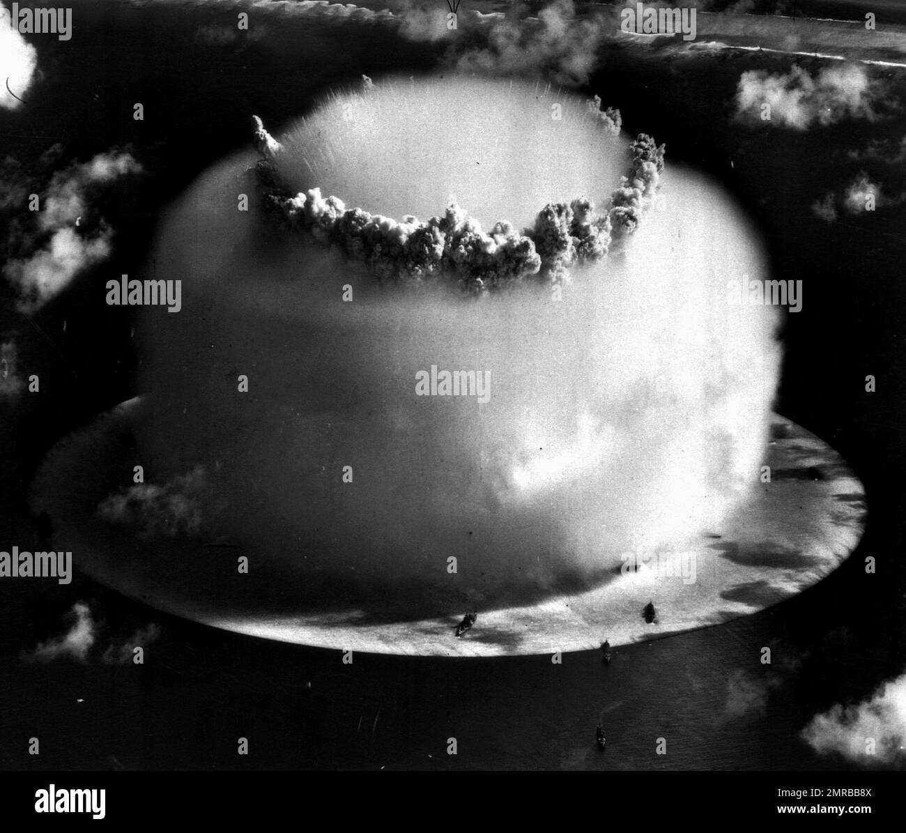 FILE - In this July 25, 1946 file photo, a huge mushroom cloud rises ...