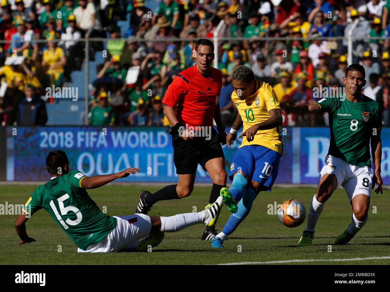 CORRECTS BYLINE - Brazil's Neymar (9) strikes the ball as Bolivia's ...