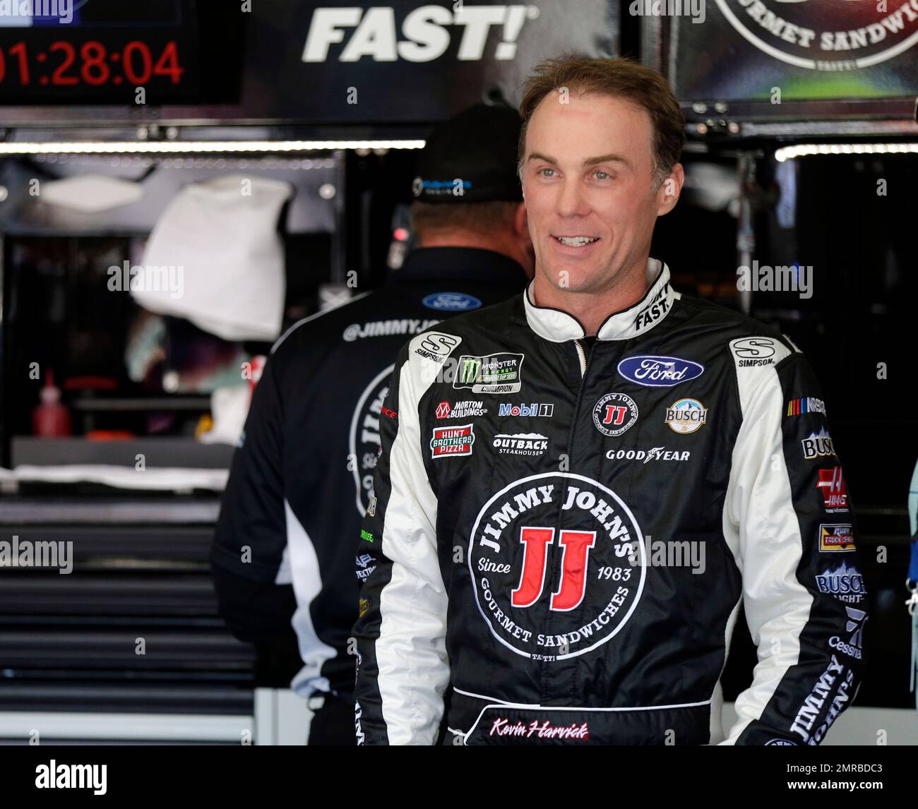 Kevin Harvick stands by his car before practice for Sunday's NASCAR Cup ...