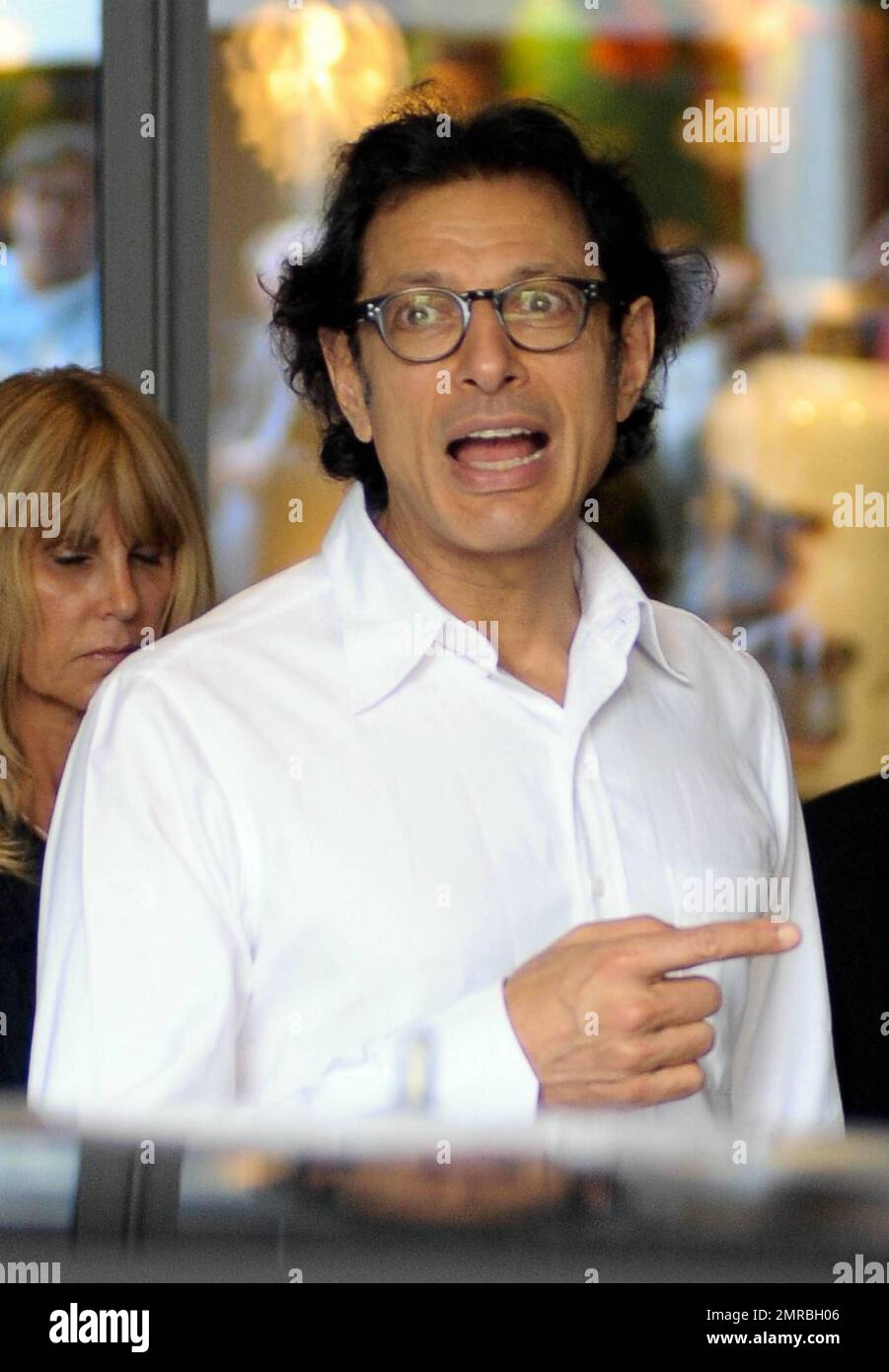Actor Jeff Goldblum makes some funny faces as he leaves his luxury ...