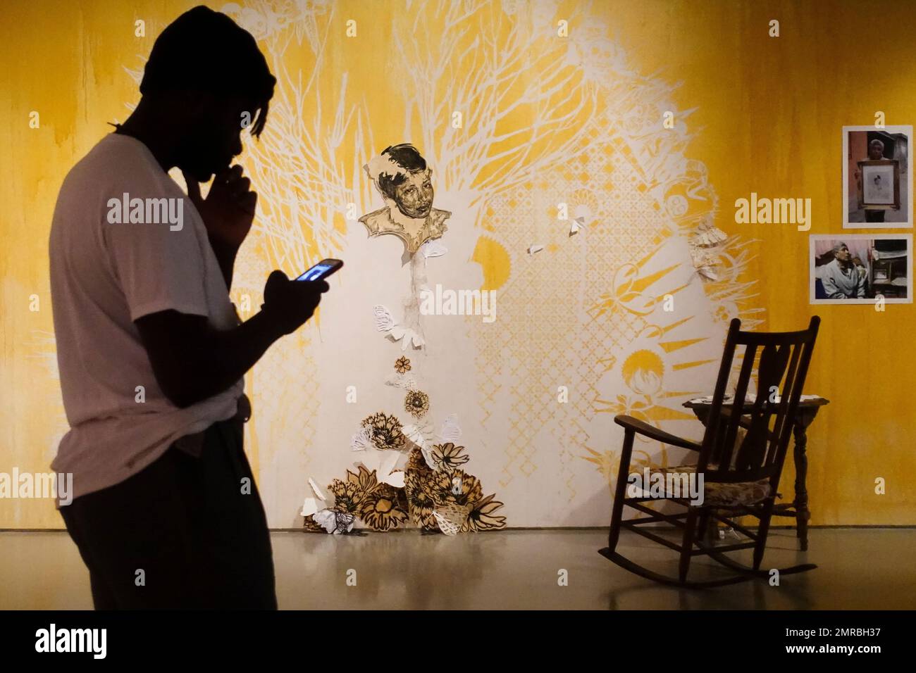 Visitors tour "The Canyon," a retrospective installation of Caledonia ...