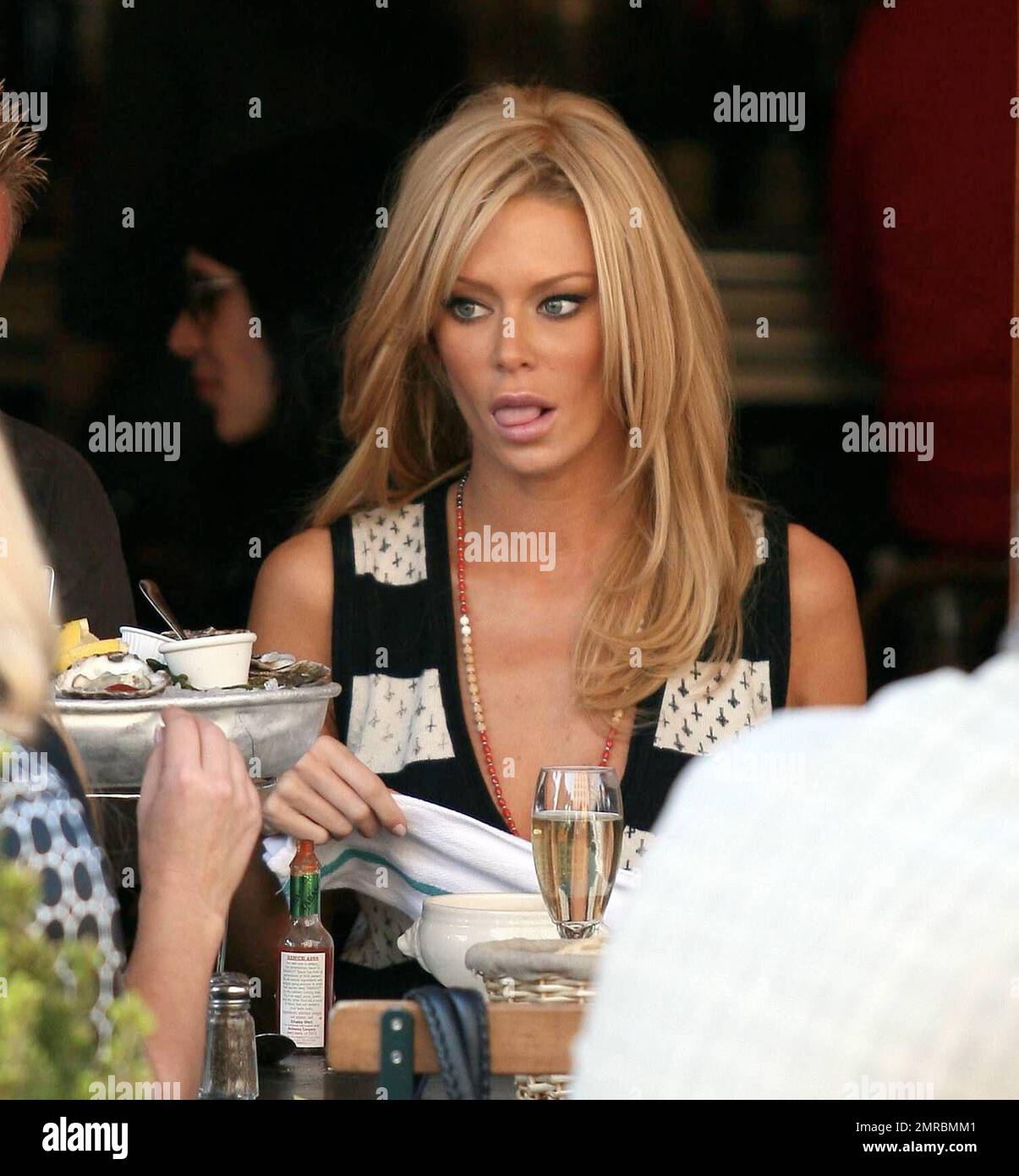 Jenna Jameson and her bodyguard have a champagne and oyster lunch at ...