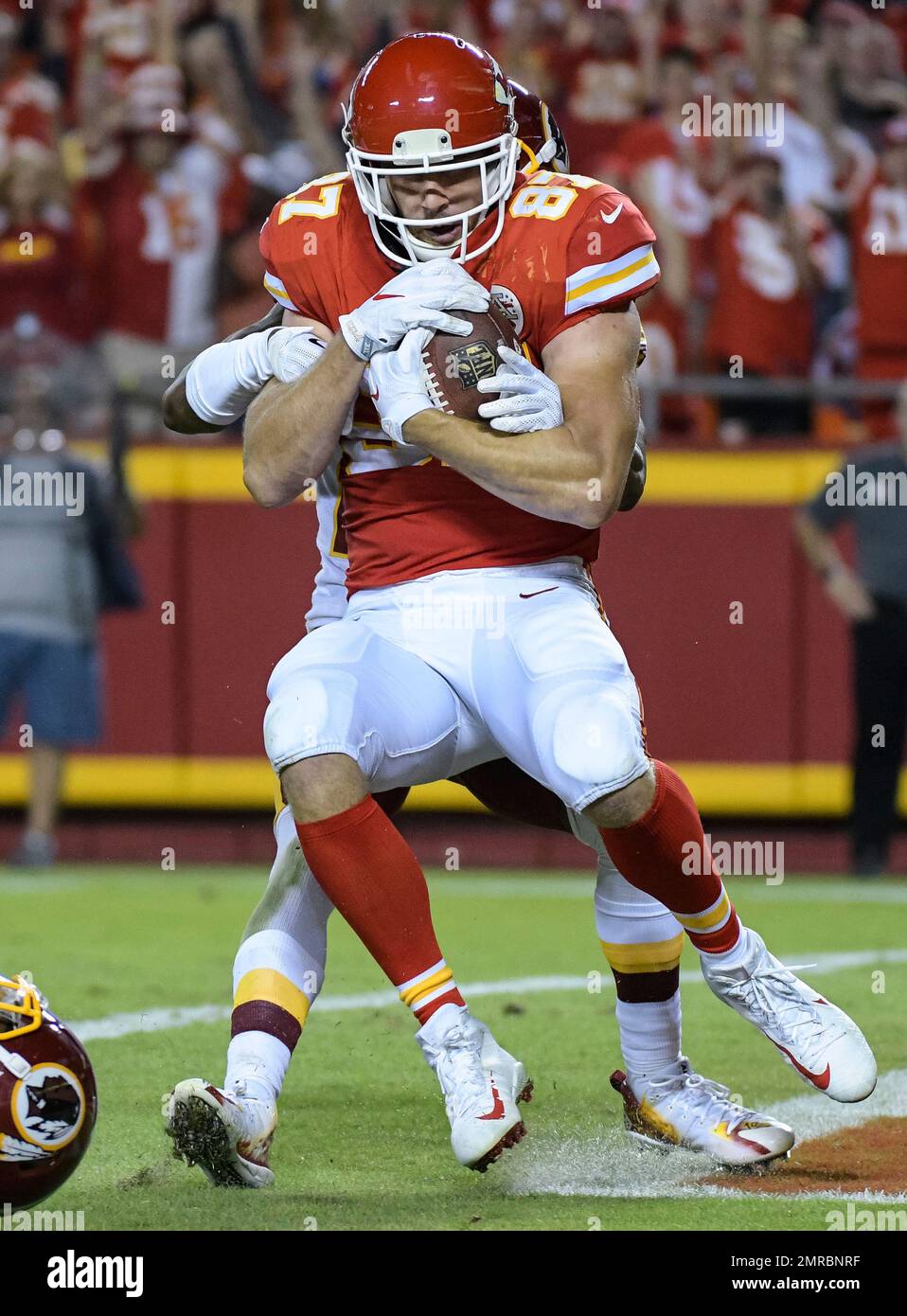 Kansas City Chiefs tight end Travis Kelce (87) catches a touchdown pass during the first half of ...