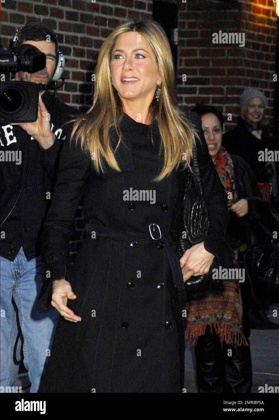"Marley & Me" star Jennifer Aniston poses for photos outside the "Late ...