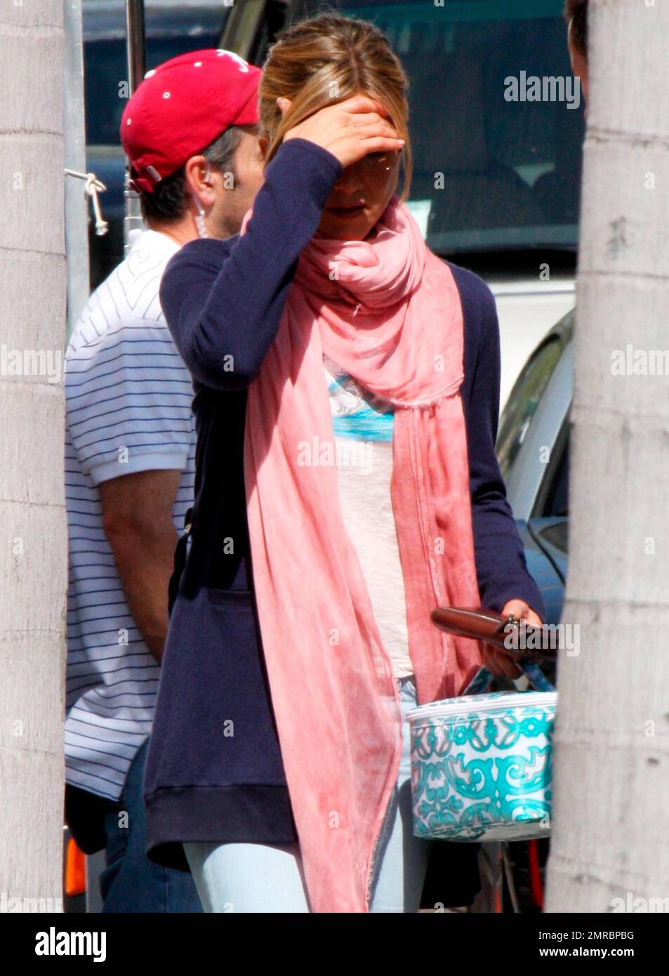 Jennifer Aniston films a scene with co-star Adam Sandler for their new ...