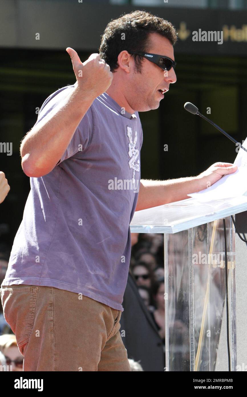 Jennifer Aniston is joined by her boyfriend Justin Theroux, father John ...