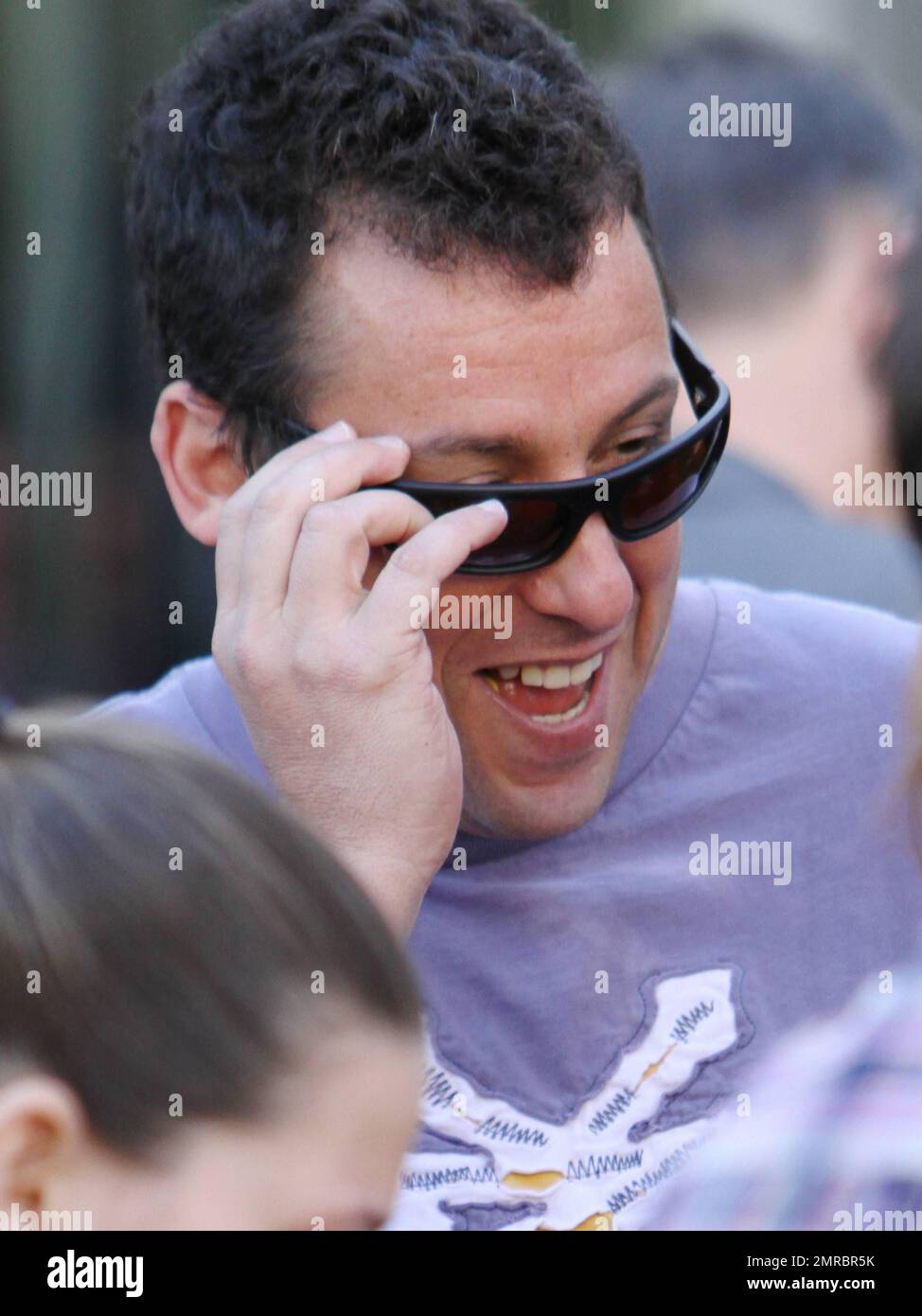 Jennifer Aniston is joined by her boyfriend Justin Theroux, father John ...