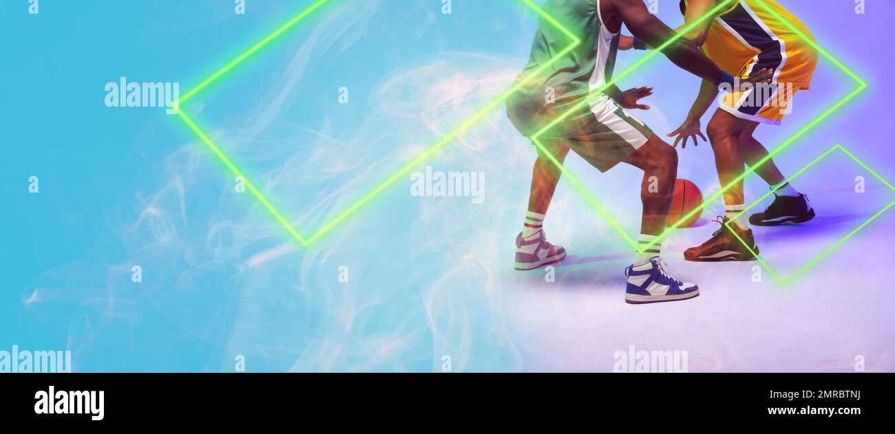 Low section of multiracial male players playing basketball by rectangle ...