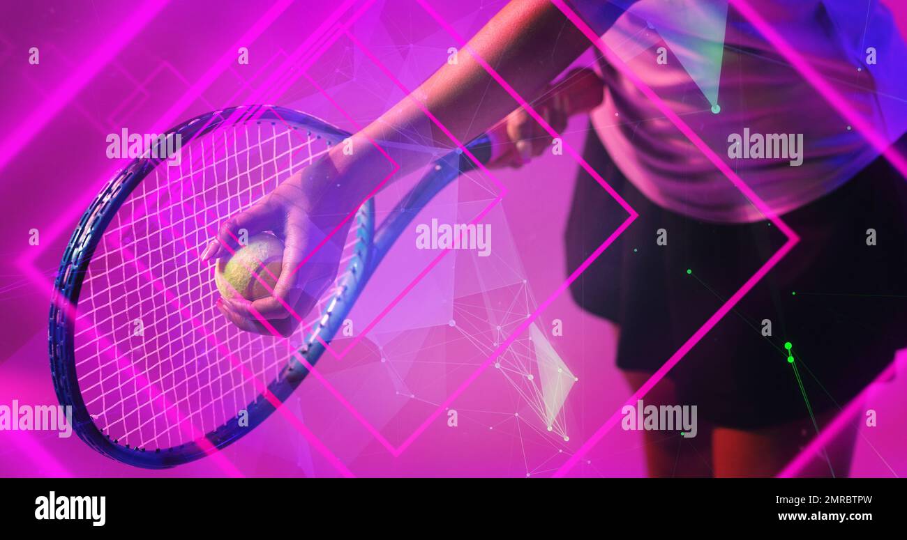 Midsection of biracial female tennis player playing with racket and ...