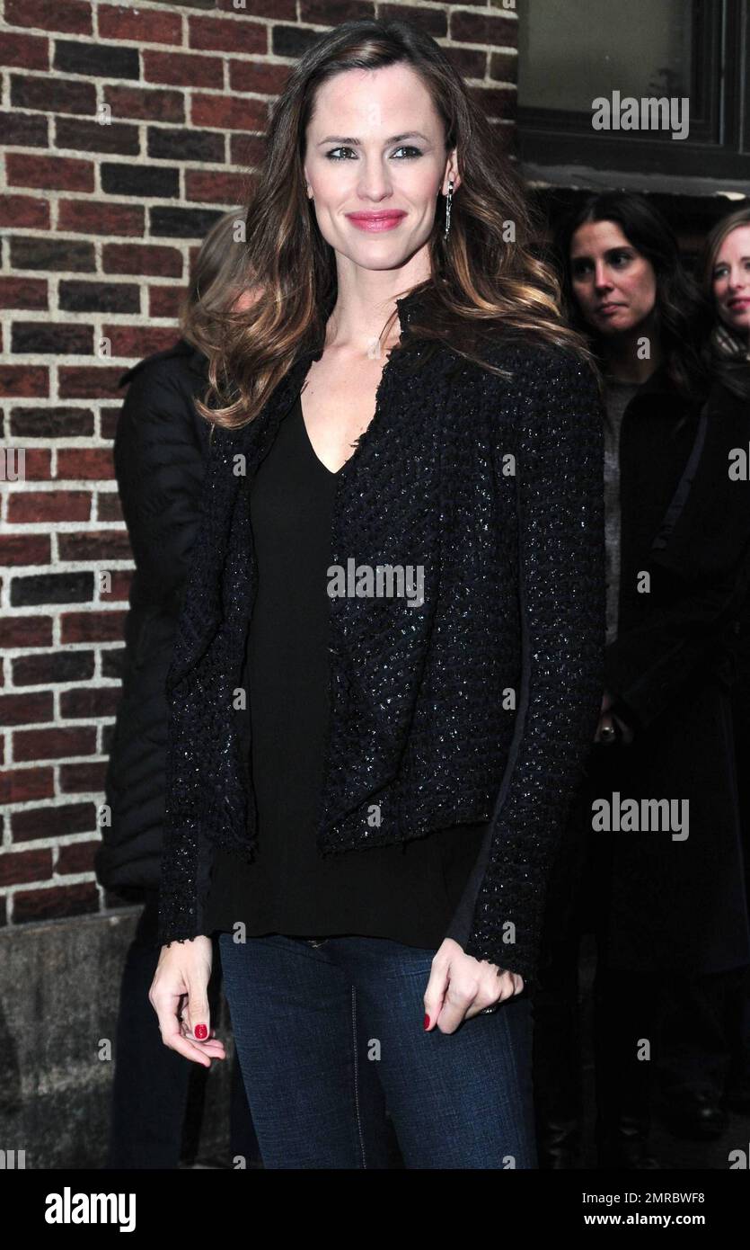 Jennifer Garner shows off her cool leather boots and shimmering jacket ...