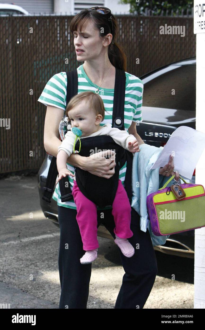 Jennifer Garner looks as though she's had a trying day as she strolls ...