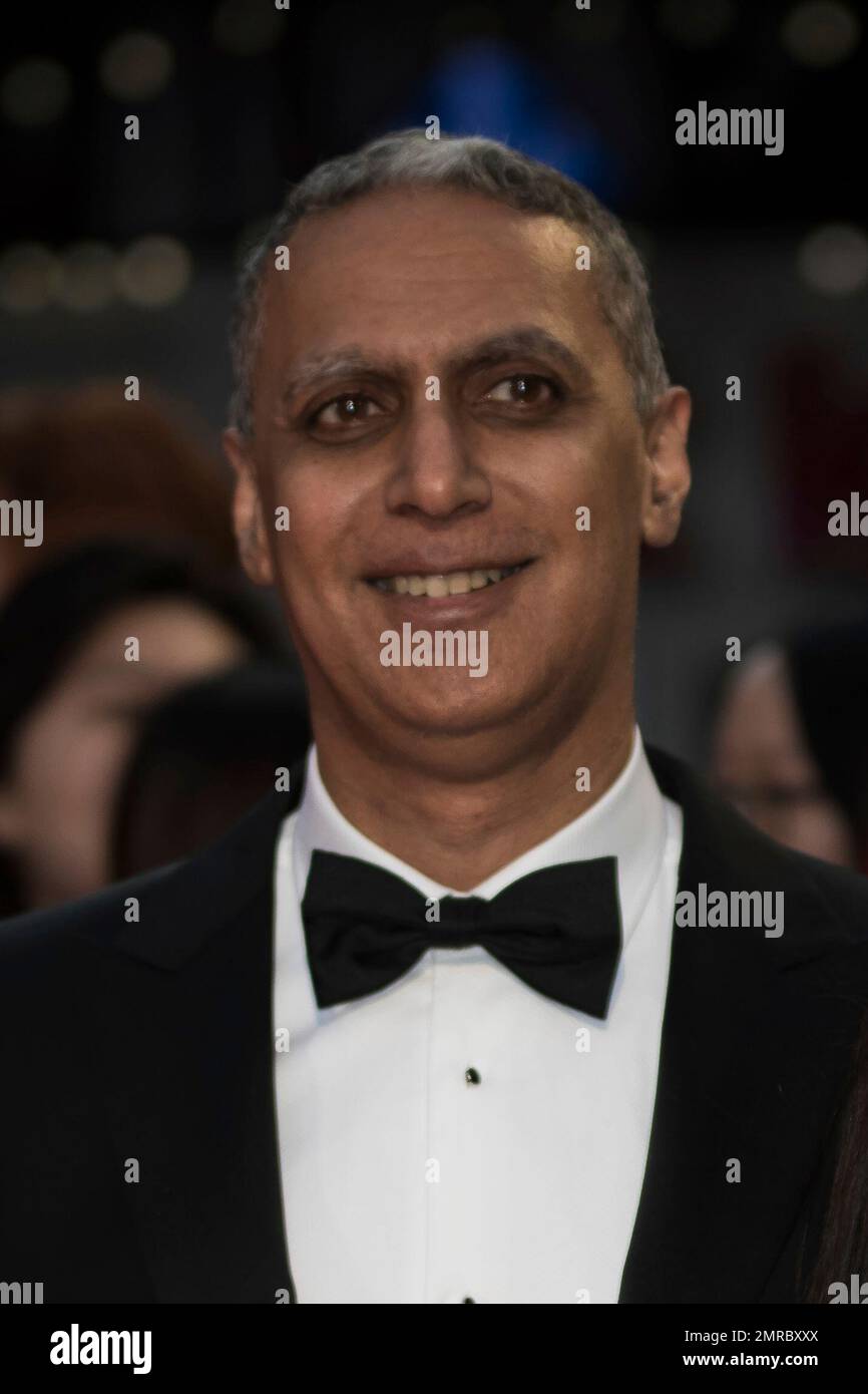 Nitin Sawhney poses for photographers upon arrival at the premiere of ...