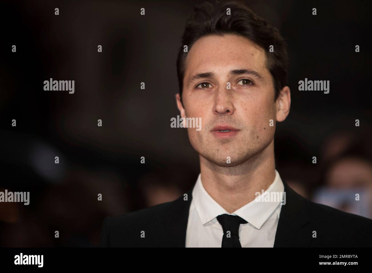 Ben Lloyd Hughes poses for photographers upon arrival at the premiere ...