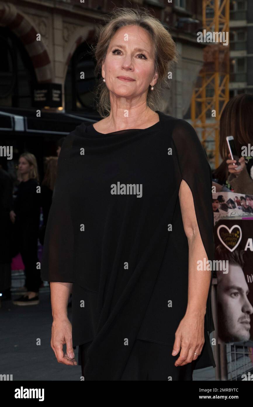 Penny Downie poses for photographers upon arrival at the premiere of ...