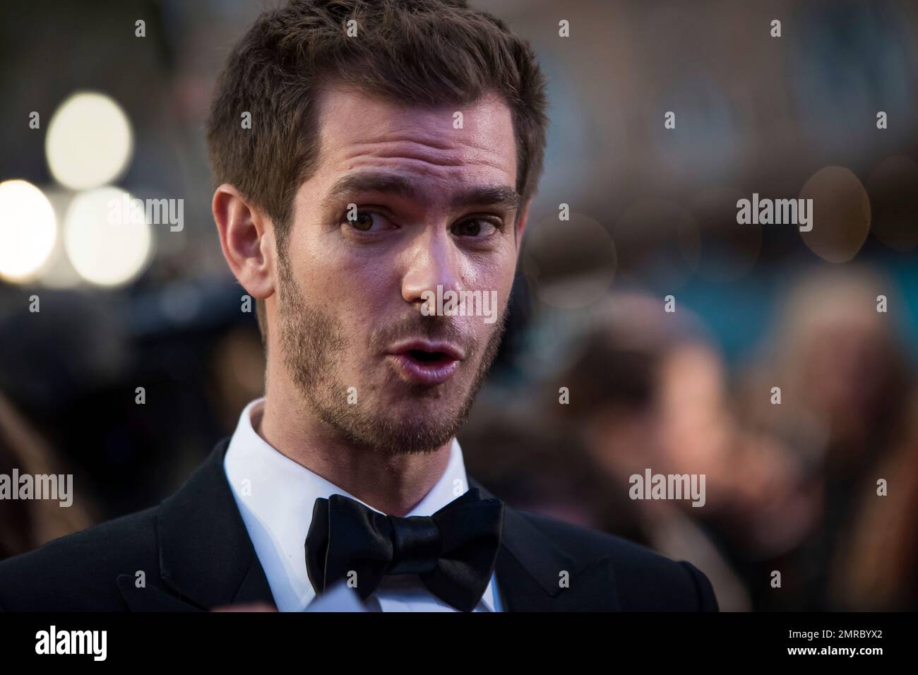 Andrew Garfield poses for photographers upon arrival at the premiere of ...