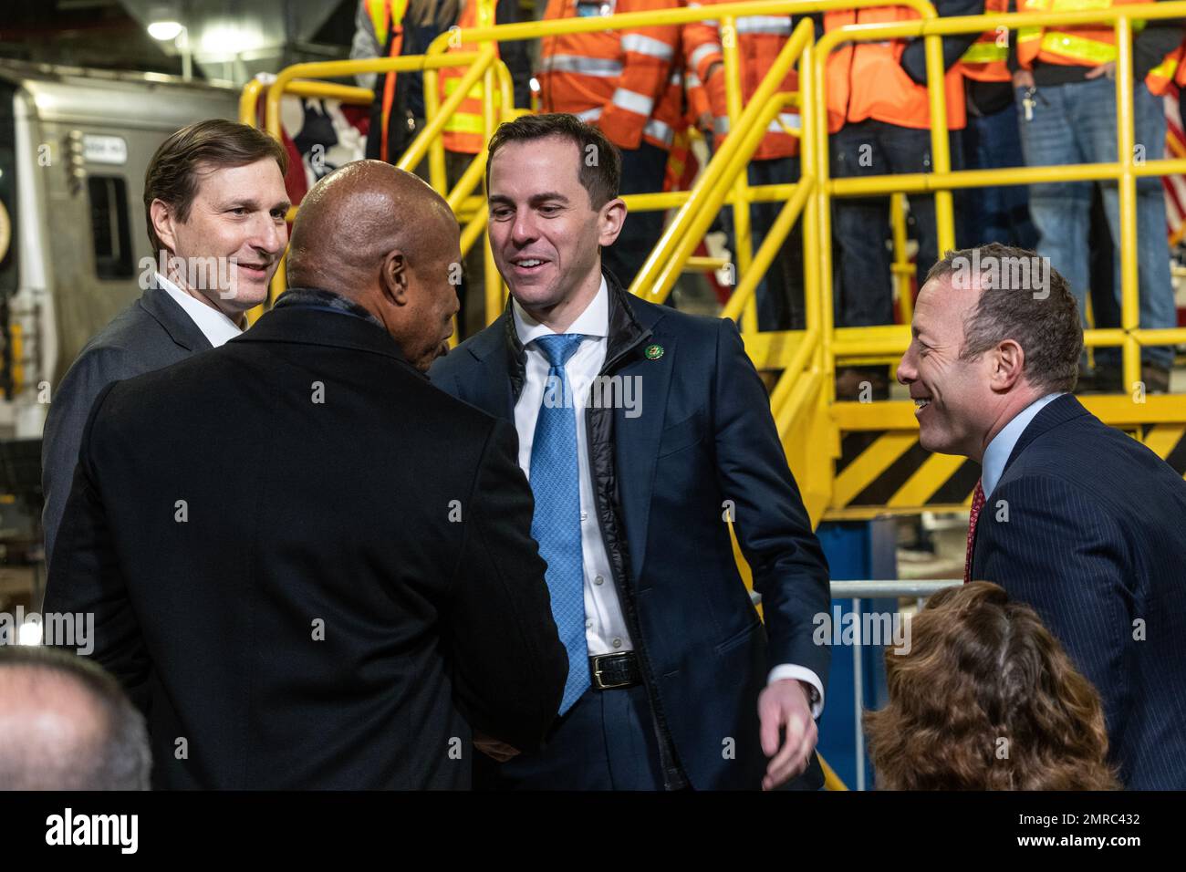 Mayor Eric Adams greets Congressmen Dan Goldman, Rob Menendez Jr., Josh ...